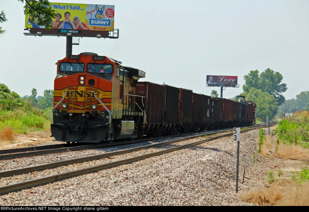 BNSF 4061 Sits wating for a clear light.